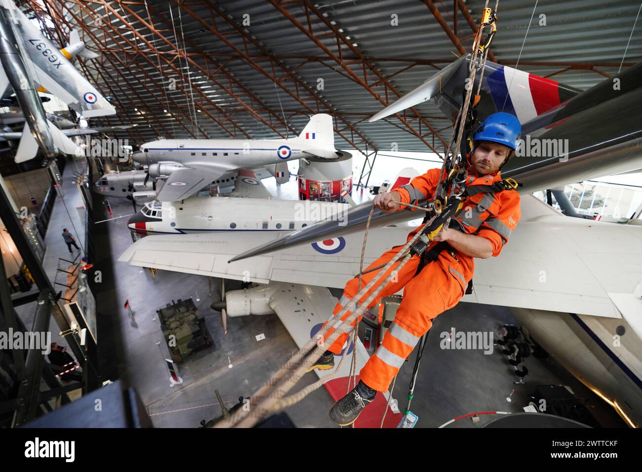 Industrial rope access specialists rappel at the Royal Air Force Museum ...