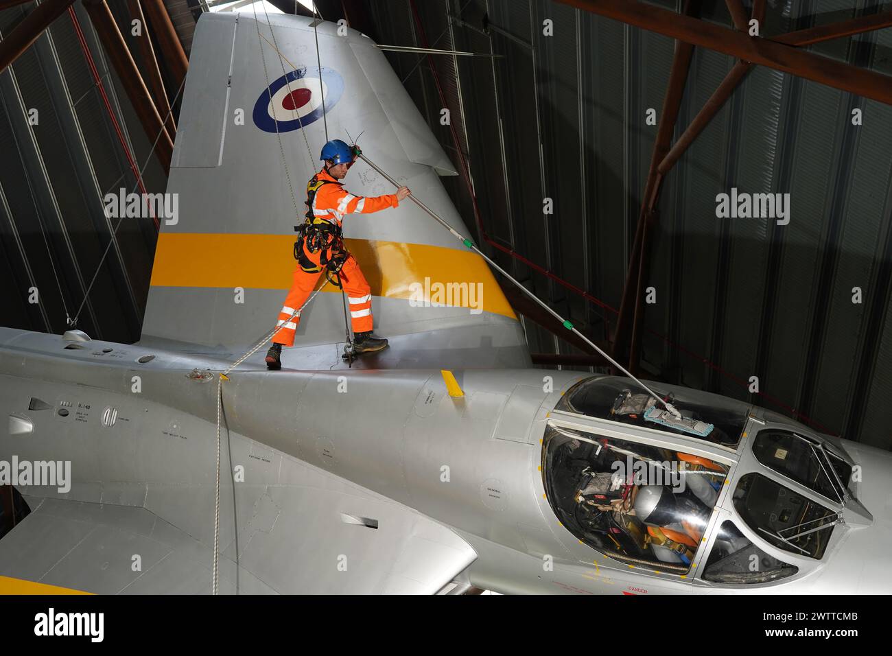 Industrial rope access specialists rappel at the Royal Air Force Museum ...