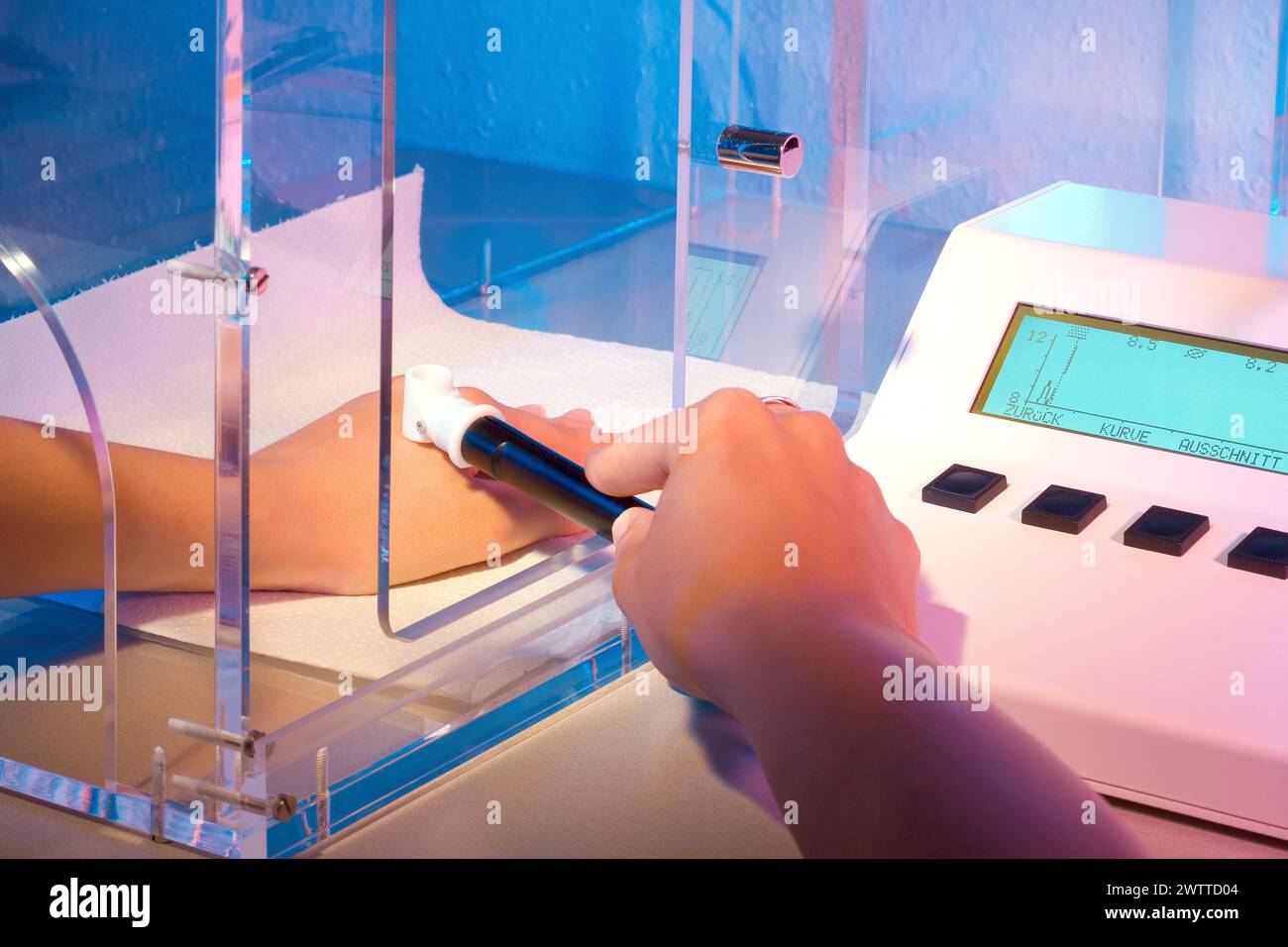 Hands conducting a scientific experiment with a futuristic device Stock ...