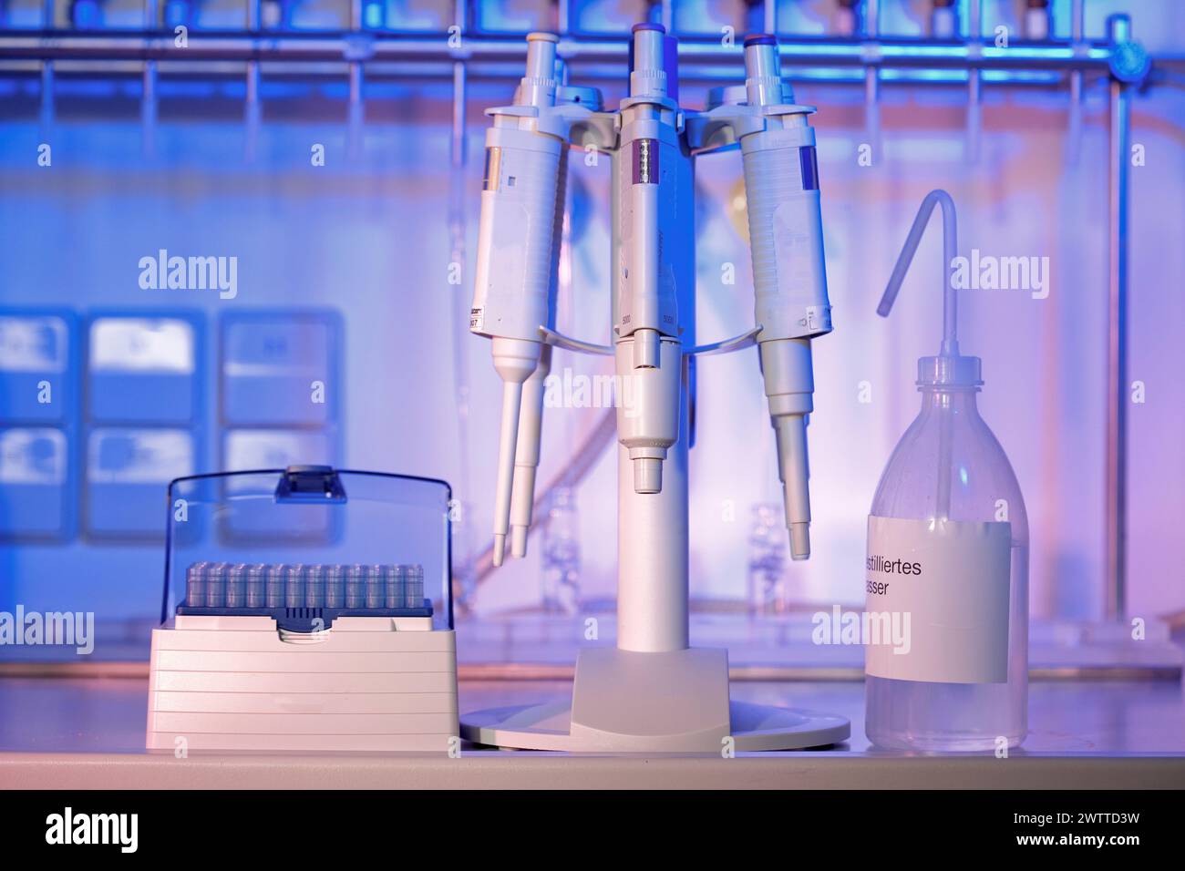 A modern laboratory setup with automated pipetting equipment Stock ...