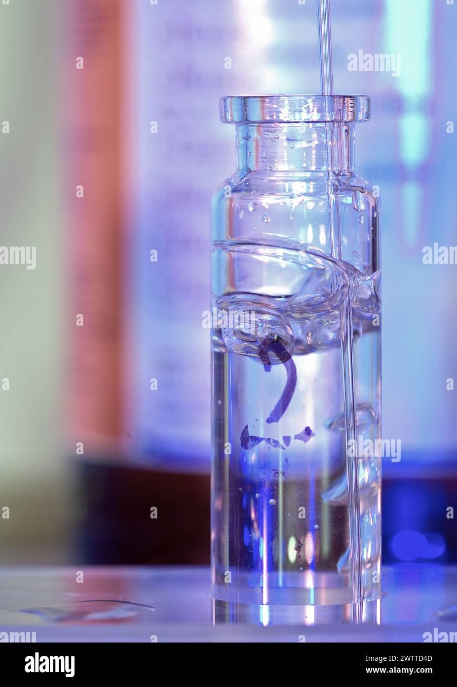 Close-up of a laboratory vial with liquid and pipette Stock Photo - Alamy