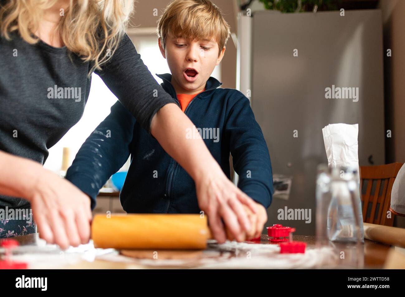 Cute boy making cookie hi-res stock photography and images - Alamy