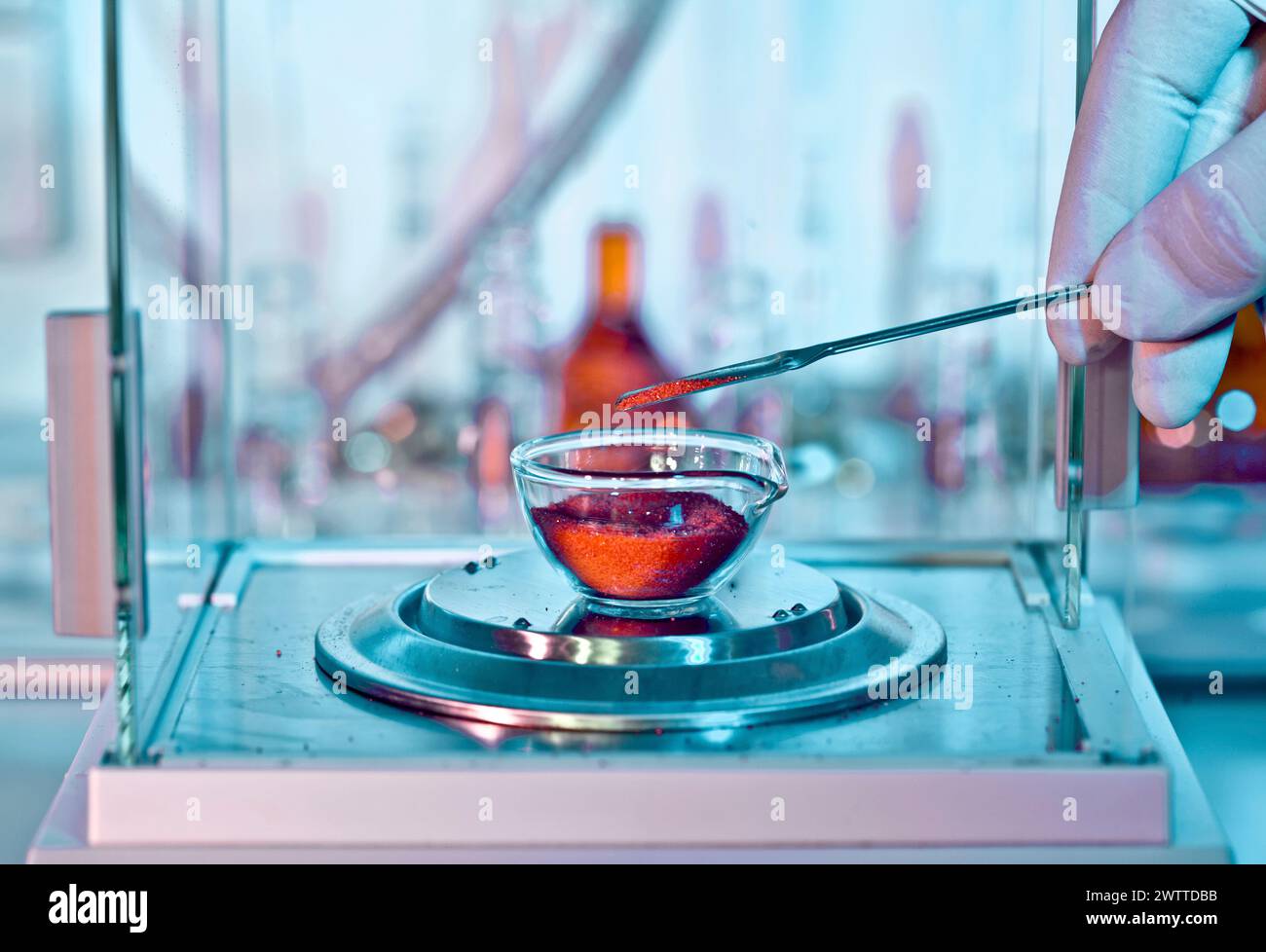 Scientist conducting a chemical experiment in a laboratory Stock Photo ...