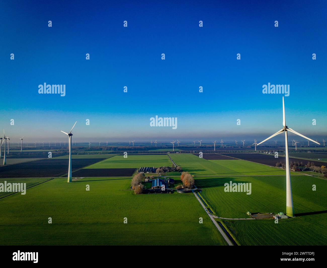 Aerial view of wind turbines dominating the countryside landscape Stock ...
