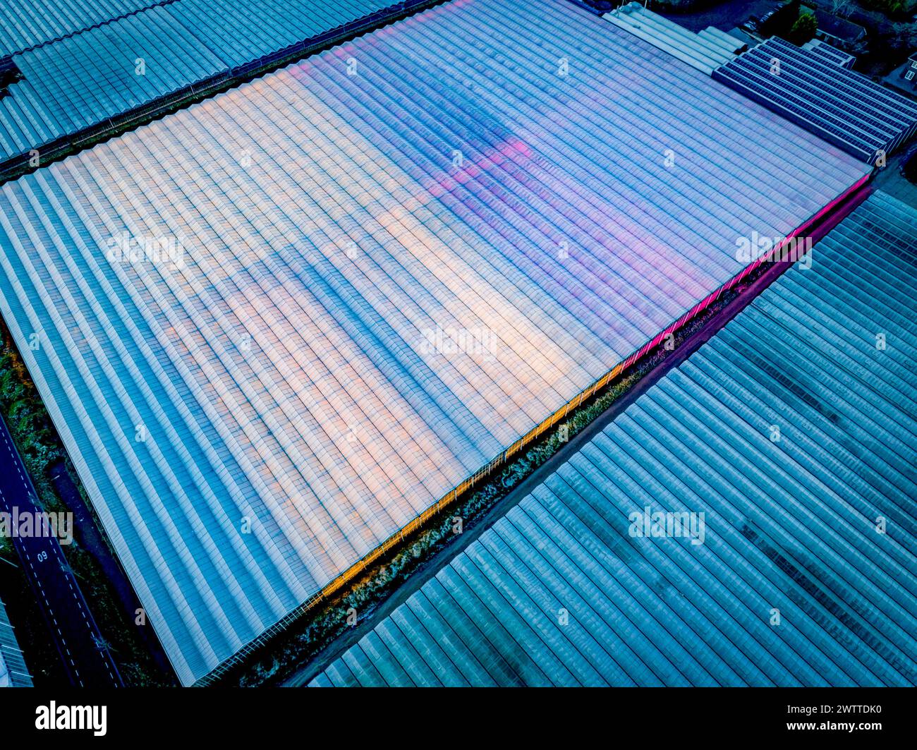 Aerial view of a vast solar panel farm at dusk Stock Photo - Alamy