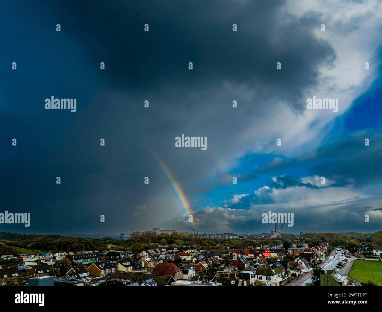 Dramatic sky over a suburban landscape with a rainbow Stock Photo - Alamy