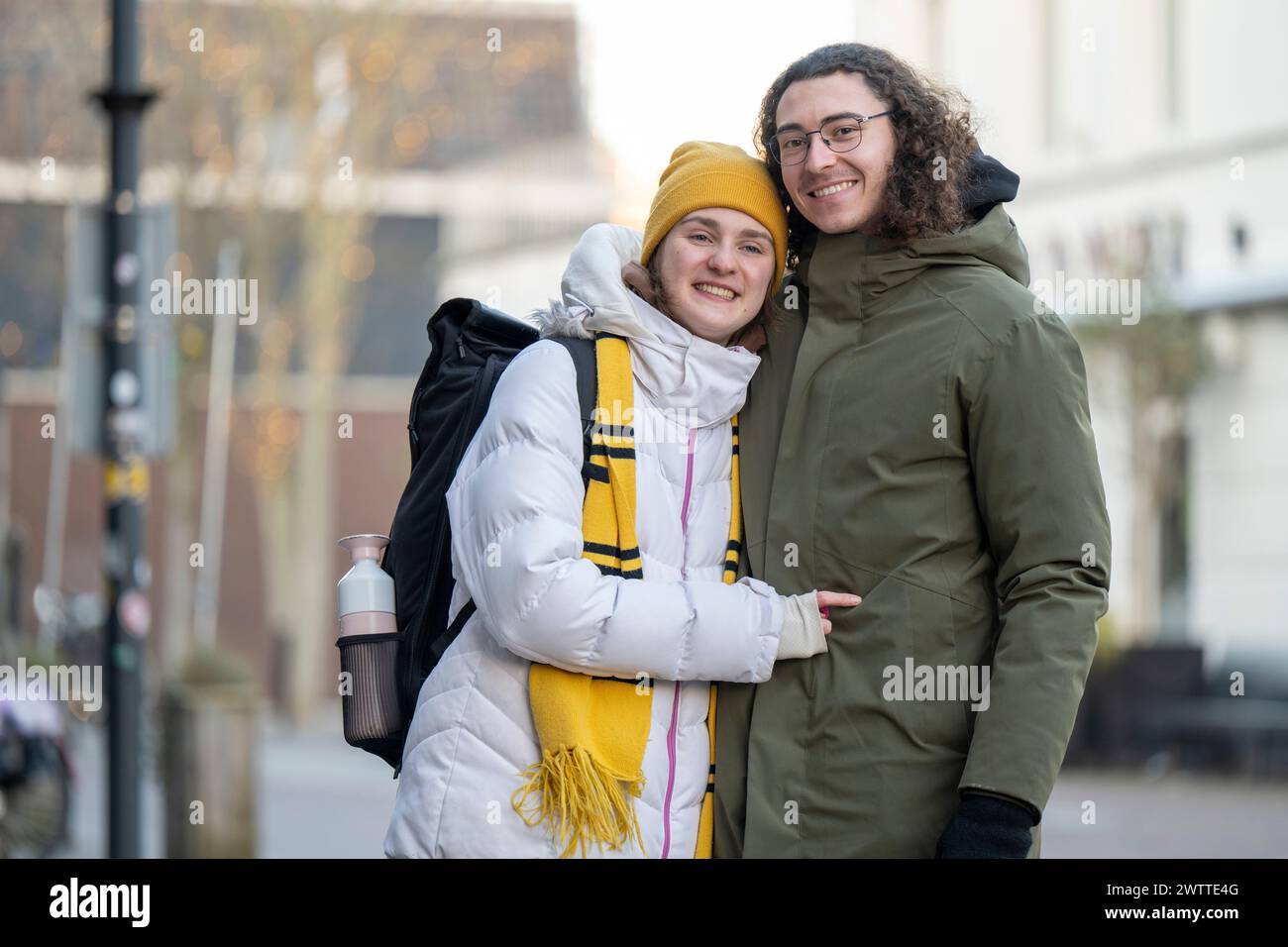 Two friends embrace hi-res stock photography and images - Alamy