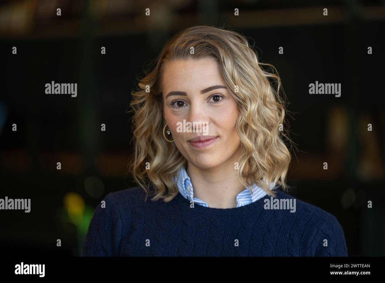 Woman with subtle smile hi-res stock photography and images - Alamy