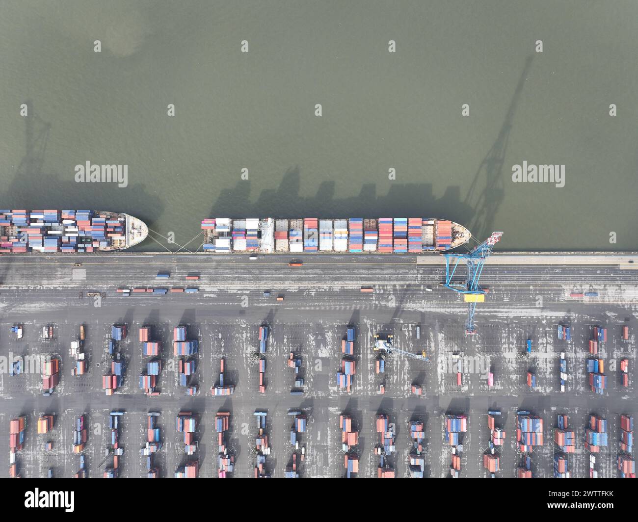 Aerial top down on container ship in the port of Antwerp, Belgium. Port ...