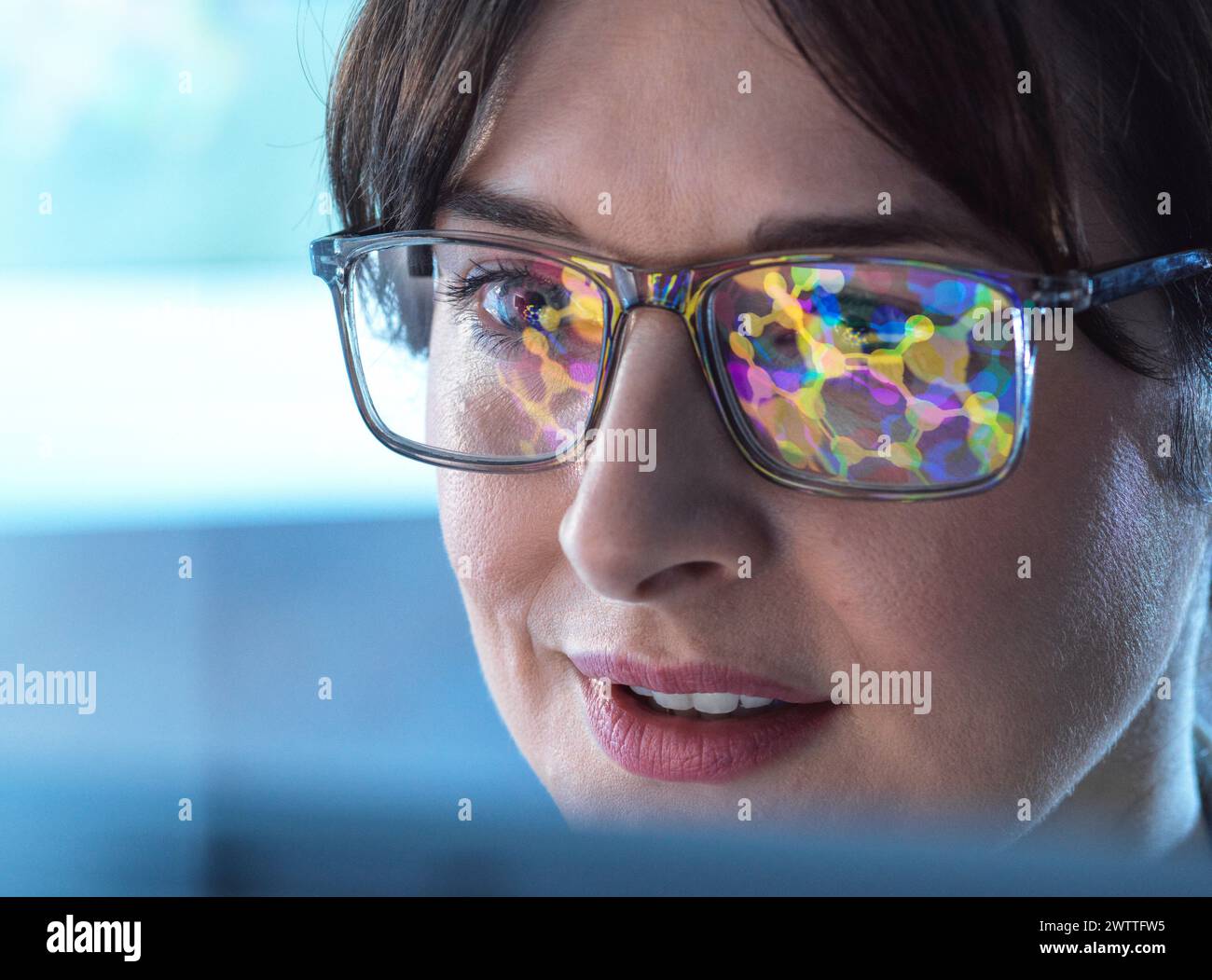 Female STEM scientist using artificial intelligence to design a ...