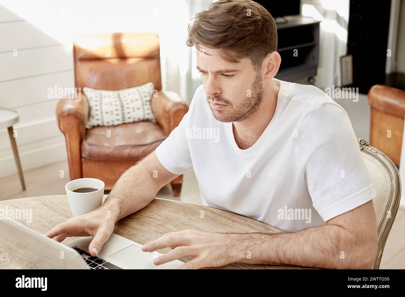 Focused man working home hi-res stock photography and images - Alamy