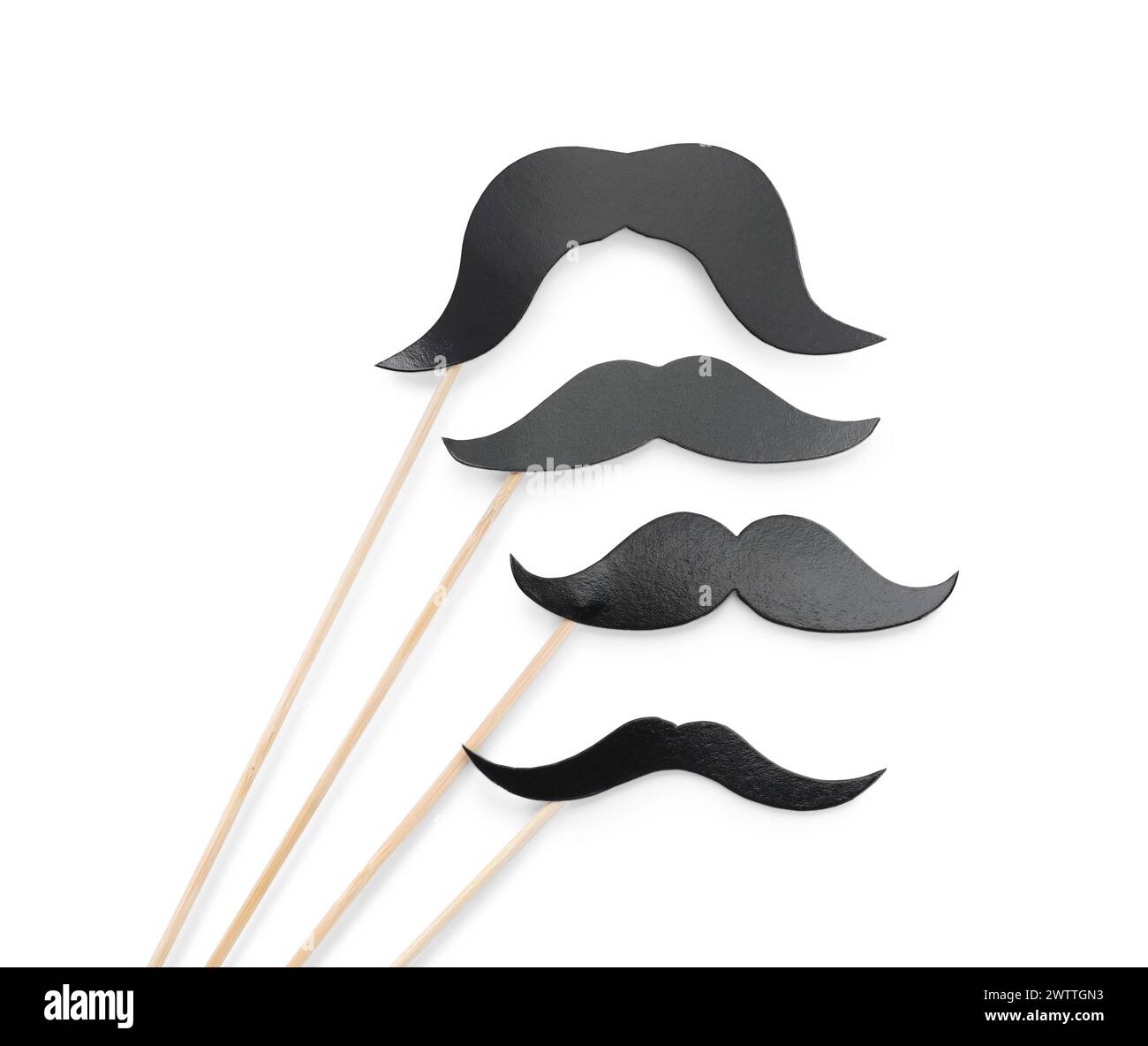 Fake paper mustaches with party props isolated on white, top view Stock ...