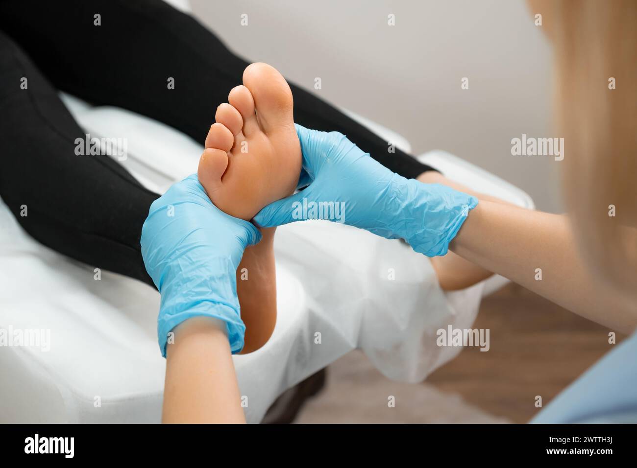 Professional massage therapist woman having hi-res stock photography ...