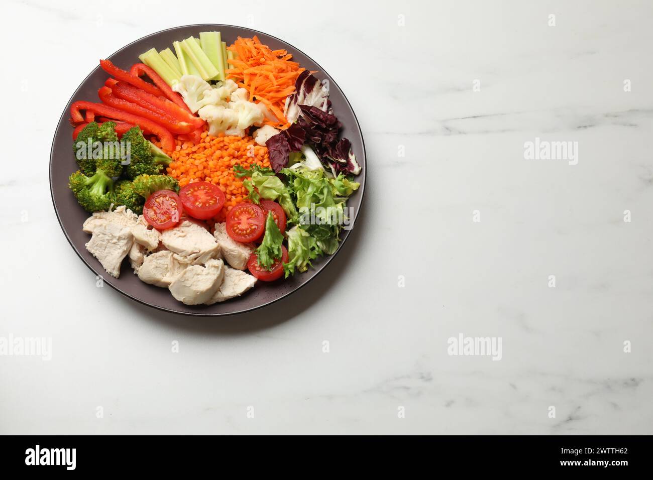 Balanced diet and healthy foods. Plate with different delicious ...