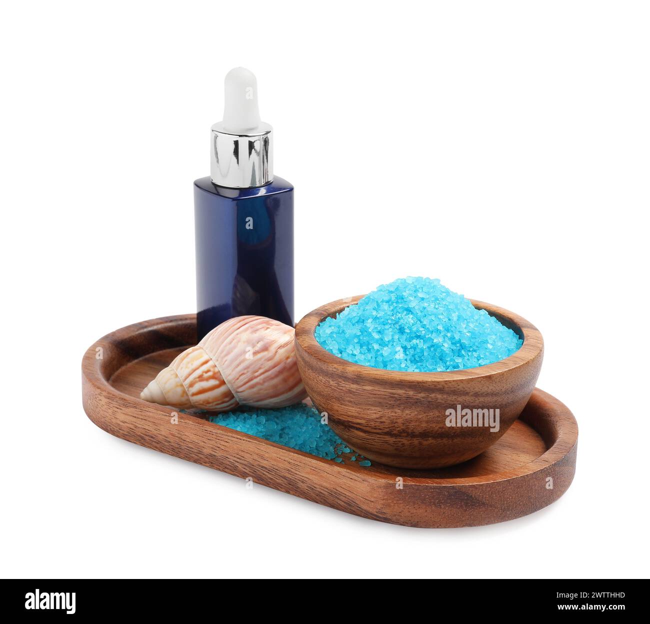 Light blue sea salt in bowl, shell and cosmetic product isolated on ...
