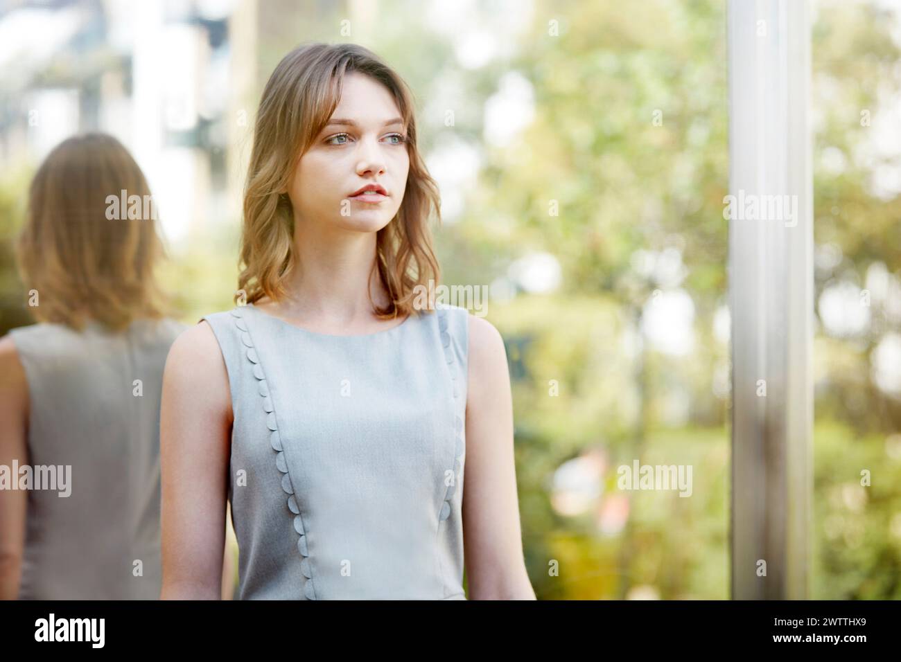 Womreflected hi-res stock photography and images - Alamy