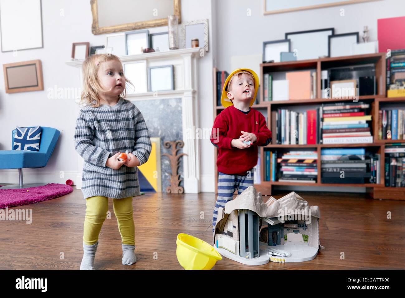 Children playing in room hi-res stock photography and images - Alamy
