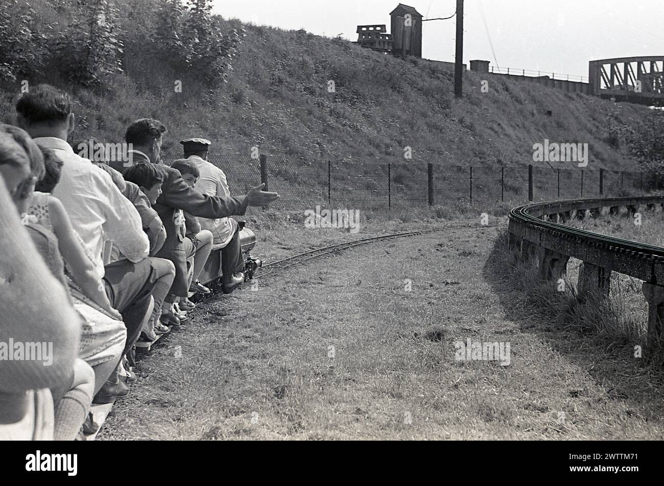 1960s, historical, summertime and outside at a miniature railway ...