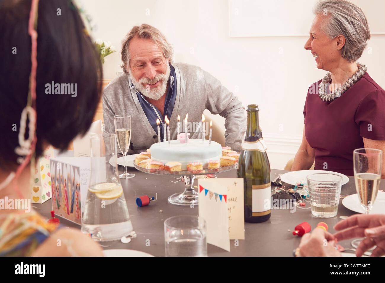 Birthday celebration with a cake and candles Stock Photo - Alamy