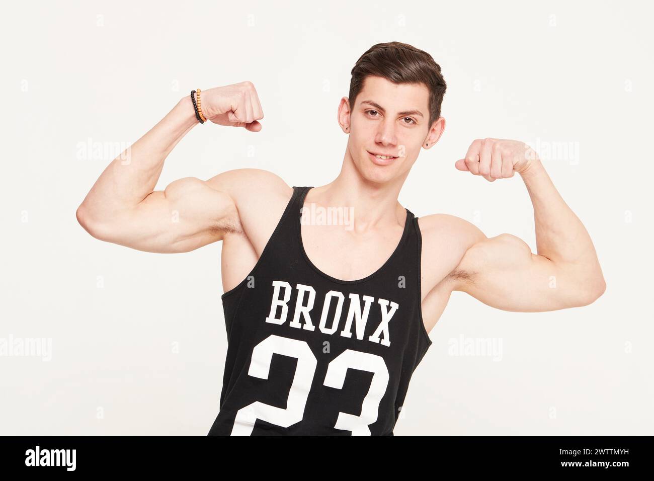 Male bodybuilder flexing biceps hi-res stock photography and images - Alamy