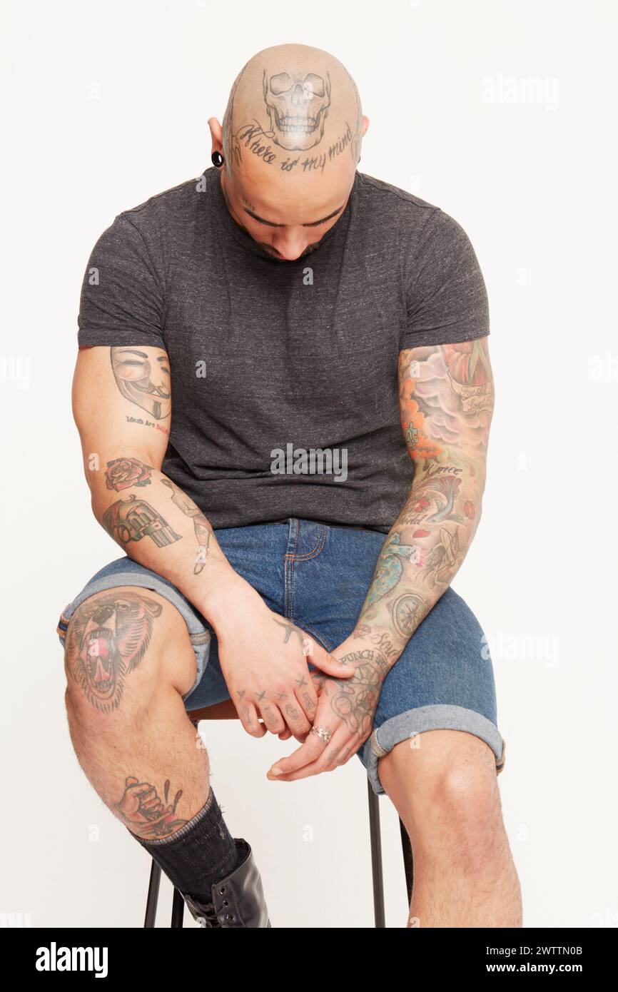 Tattoos on legs hi-res stock photography and images - Alamy