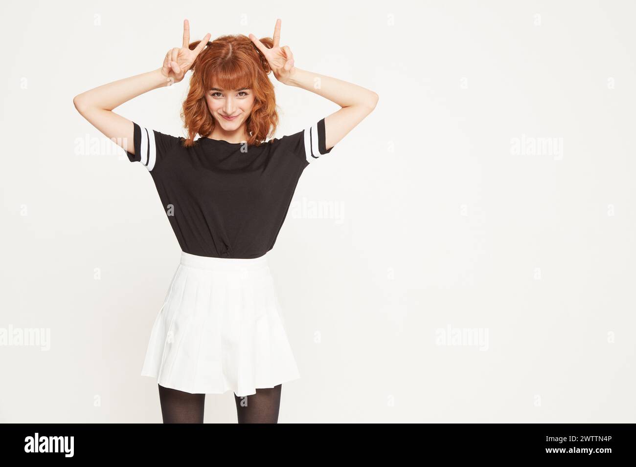 Bunny ears hands hi-res stock photography and images - Alamy