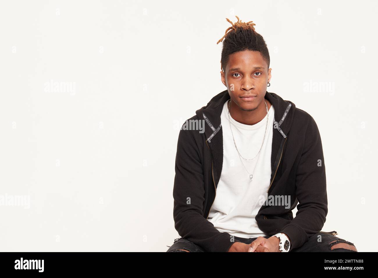 Person in white clothing hi-res stock photography and images - Alamy