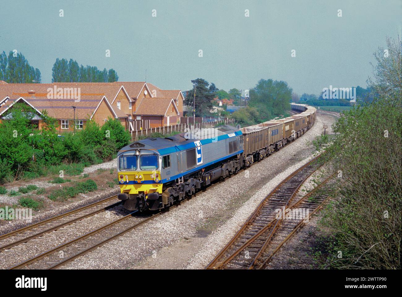 A Class 59 diesel locomotive number 59001 working a jumbo train of ...