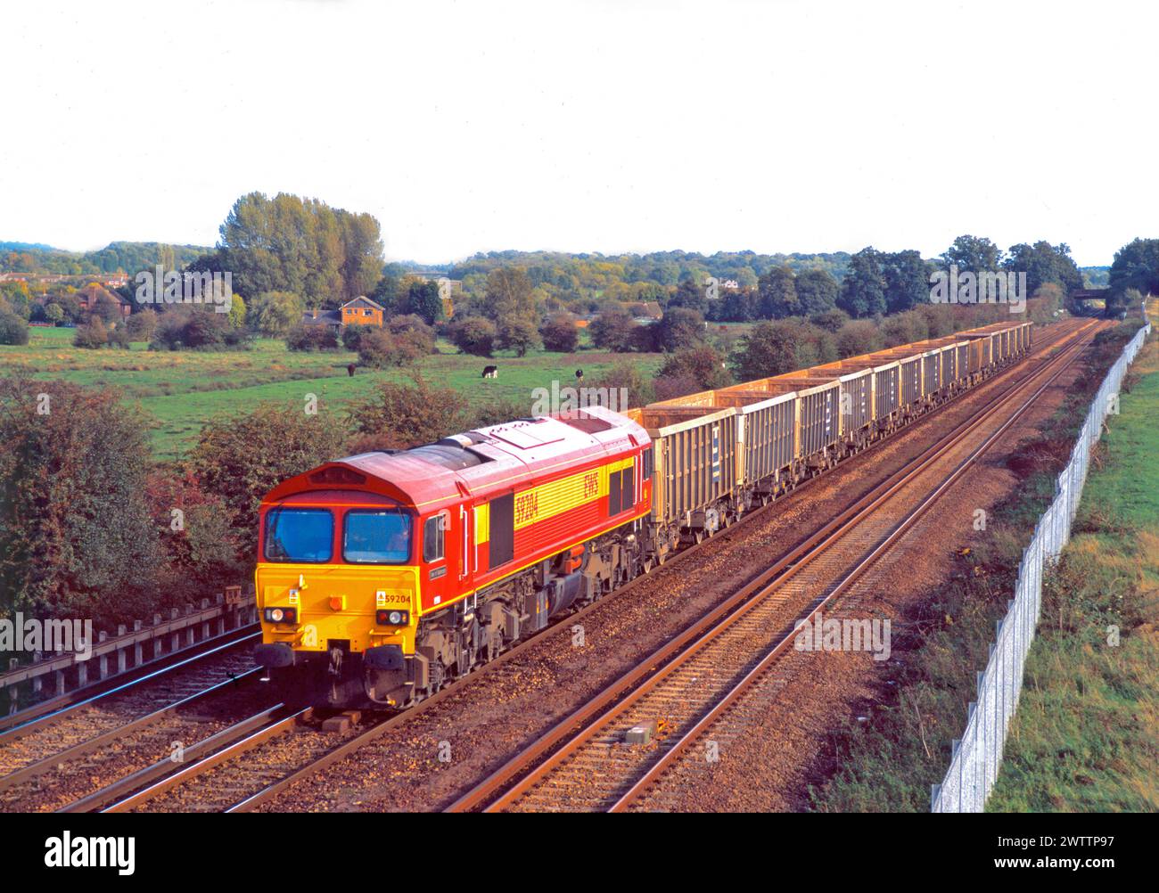 A Class 59 diesel locomotive number 59204 working a train of empty ...