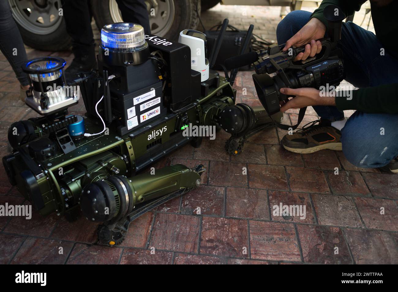Malaga, Spain. 19th Mar, 2024. A cameraman takes a video of a robotic ...