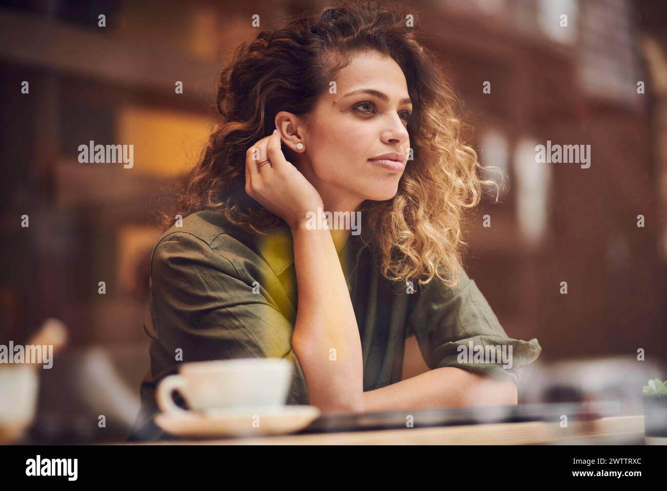 Portrait woman sitting cafe hi-res stock photography and images - Alamy