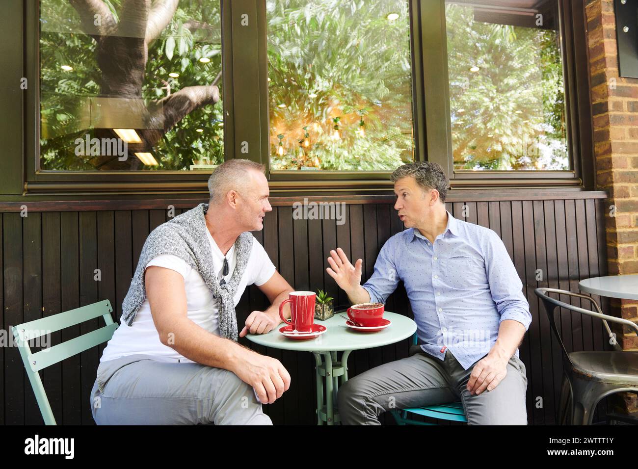 Two men at cafe hi-res stock photography and images - Alamy