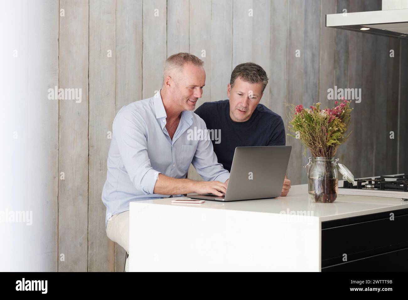 Two men with laptop computer hi-res stock photography and images - Alamy