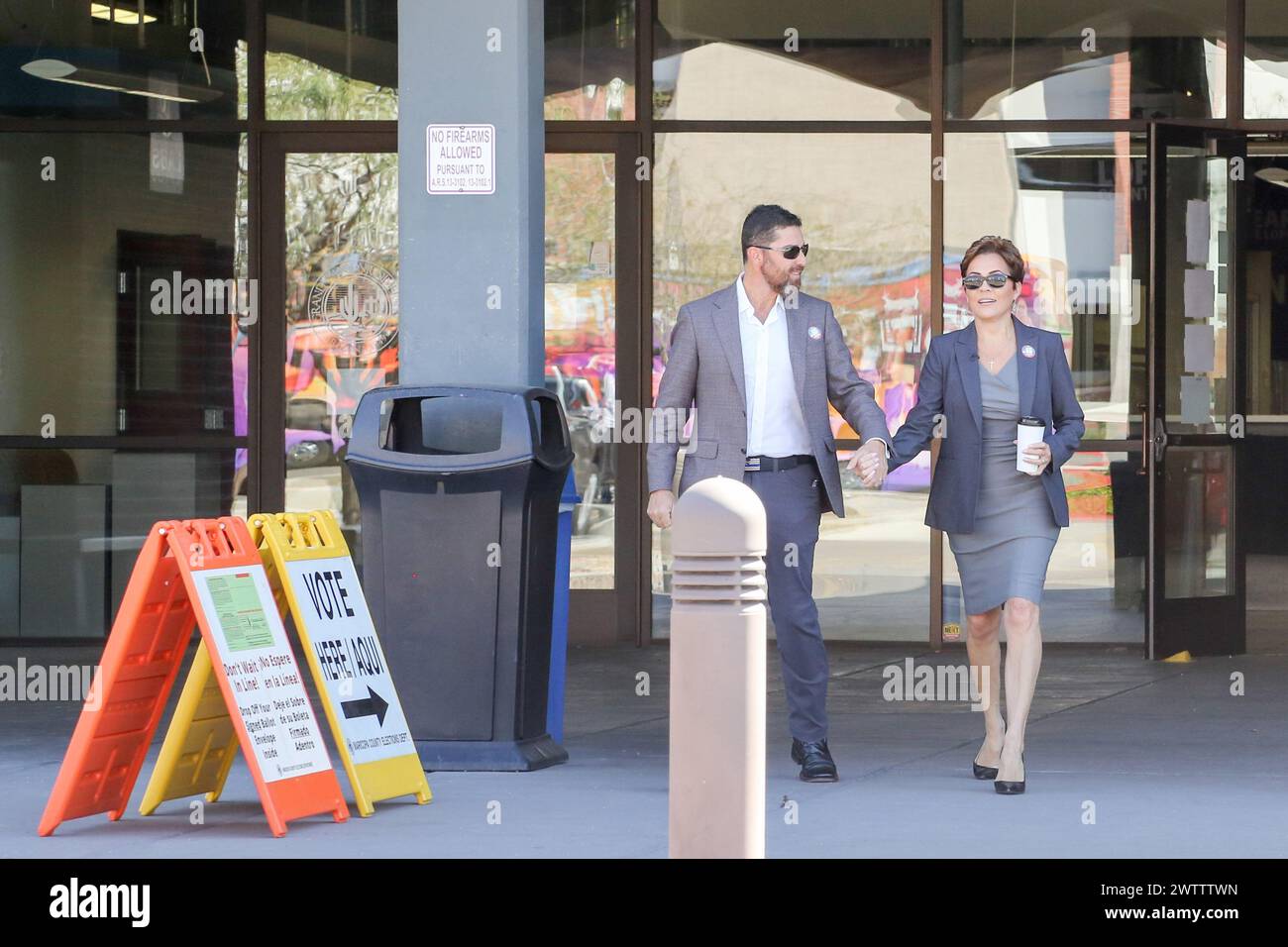 Republican Senate Candidate Kari Lake walks with her husband Jeff ...