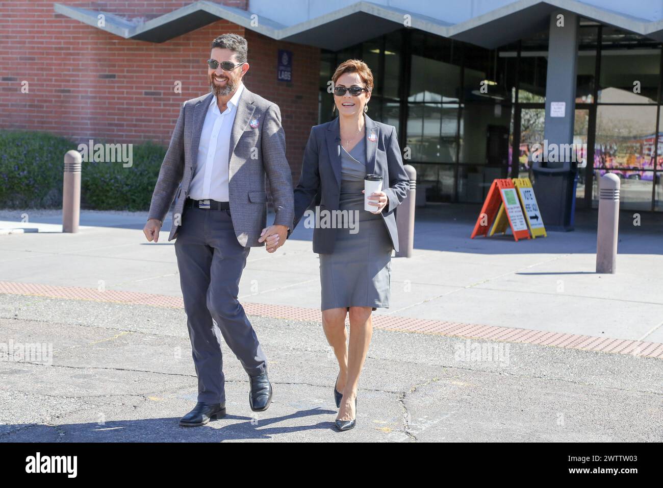 Republican Senate Candidate Kari Lake walks with her husband Jeff ...