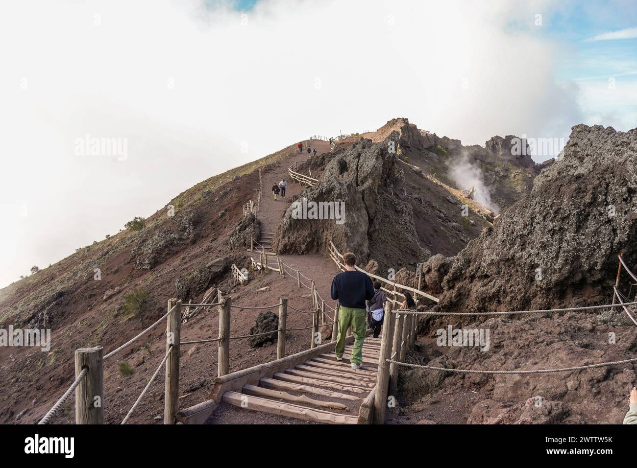 Visitors walking up the crater of the Vesuvius volcano, Naples, Italy ...