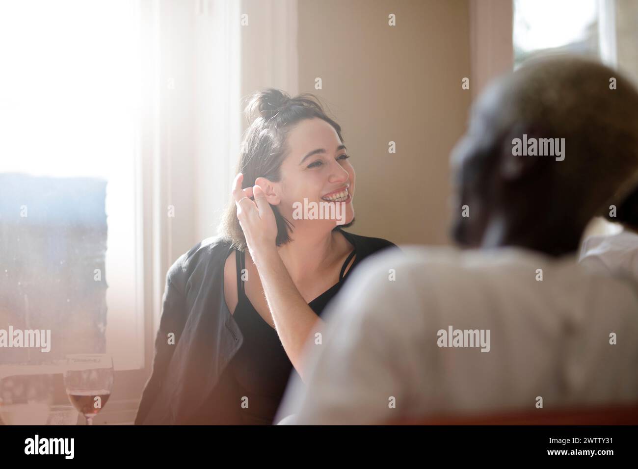 Happy woman enjoying conversation hi-res stock photography and images ...