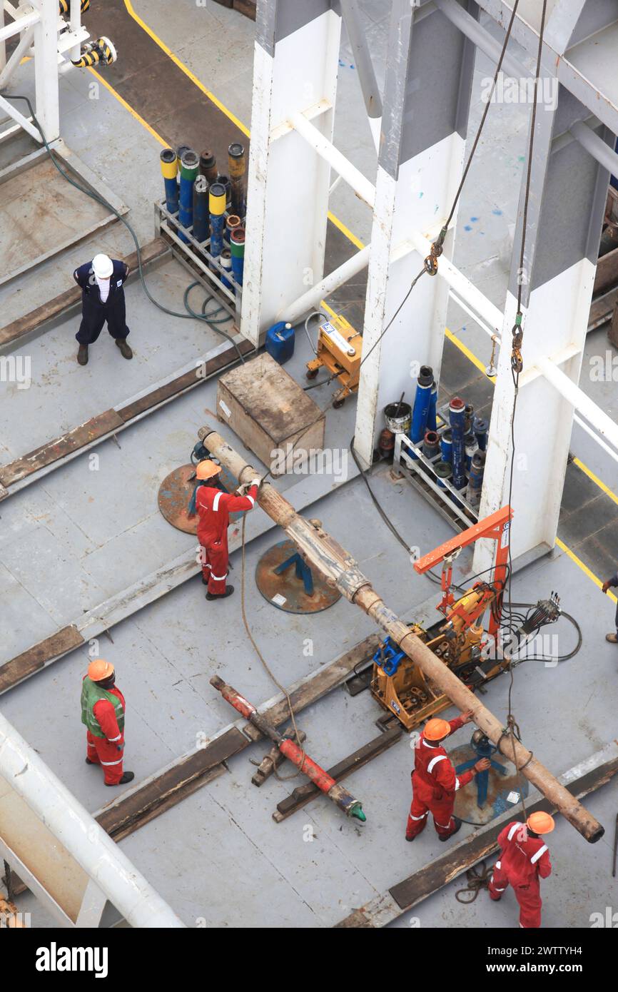 Workers on an oil rig Stock Photo - Alamy