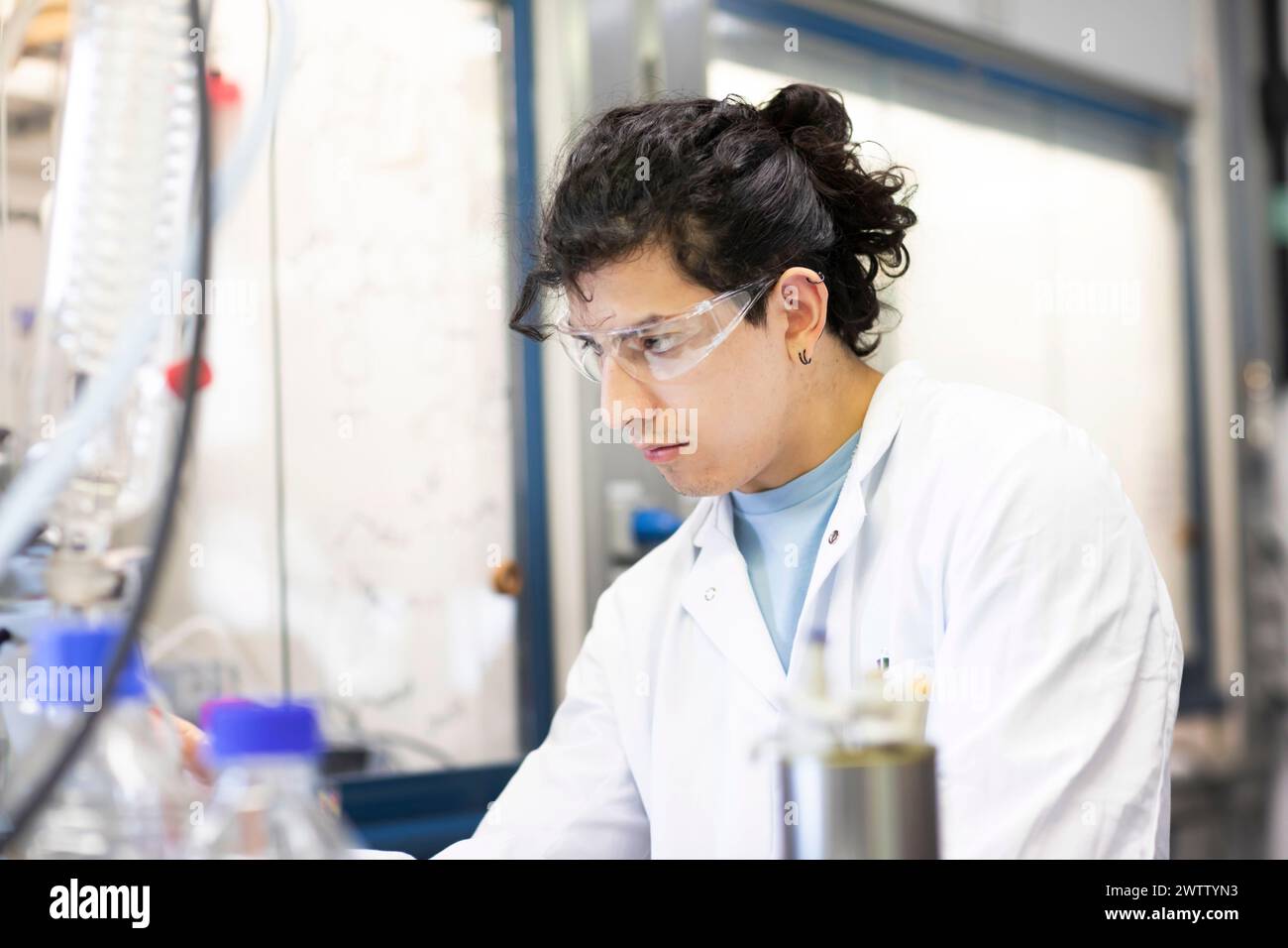 Scientist concentrating on laboratory research Stock Photo - Alamy