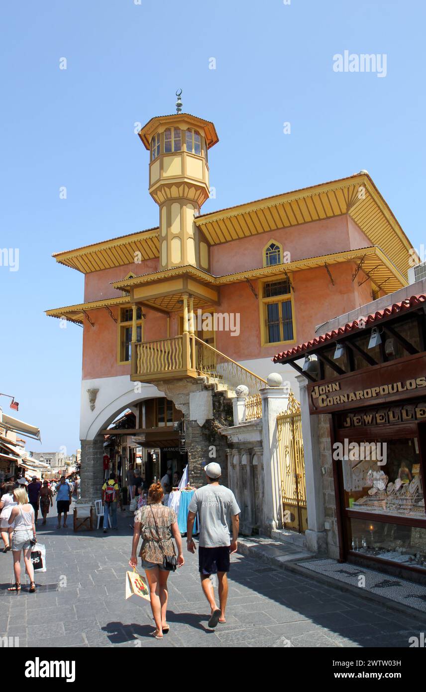 RHODES, GREECE-JULY 05,2011:Unidentified People walking by the ...