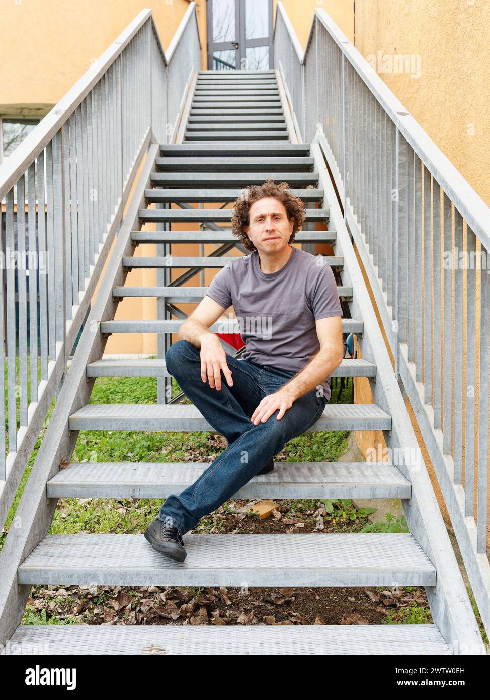 Man in front stairs hi-res stock photography and images - Alamy