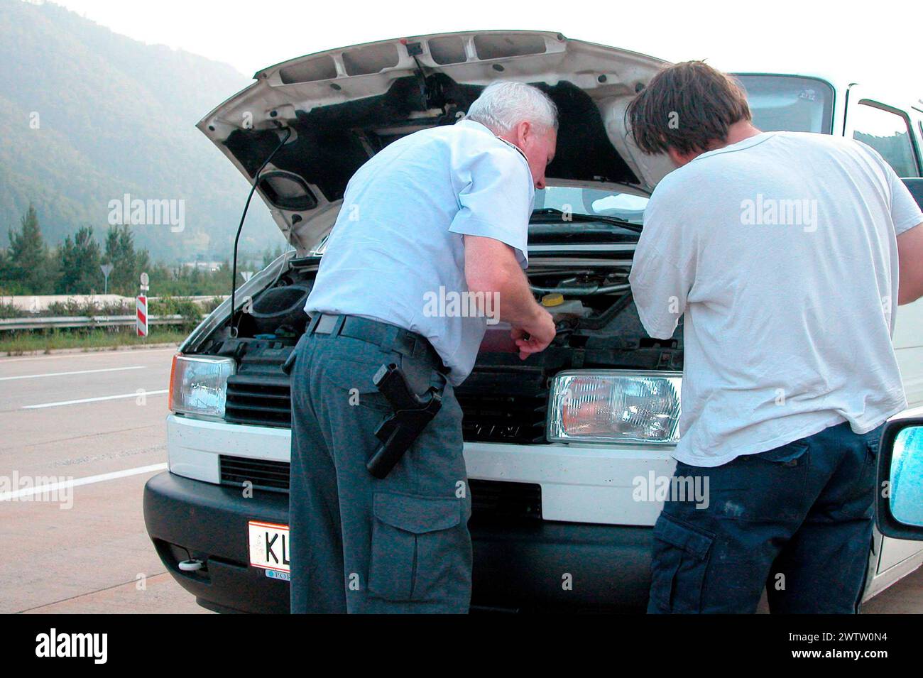 car repair after a breakdown, fixing broken parts of an automobile car ...