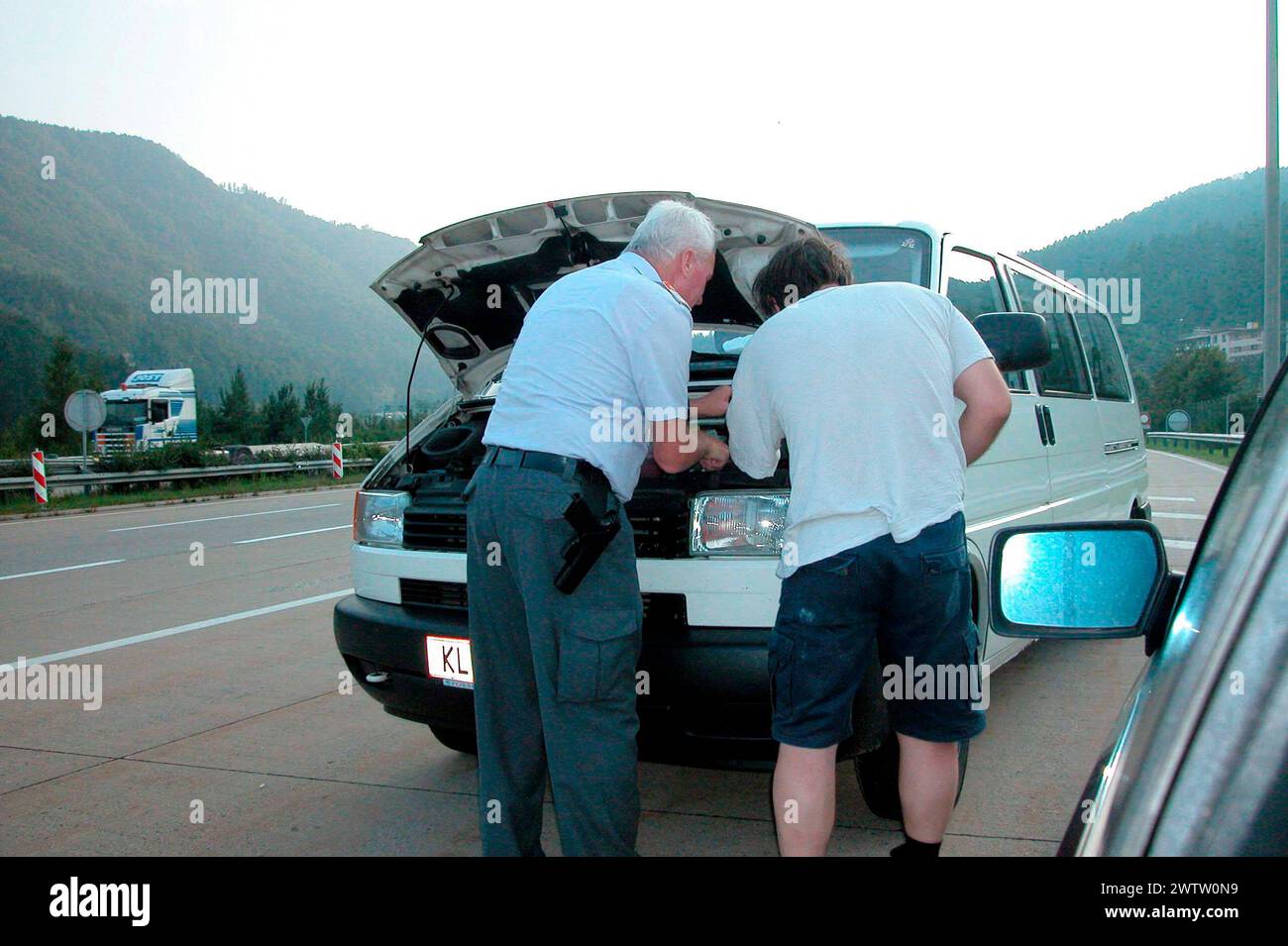 car repair after a breakdown, fixing broken parts of an automobile car ...