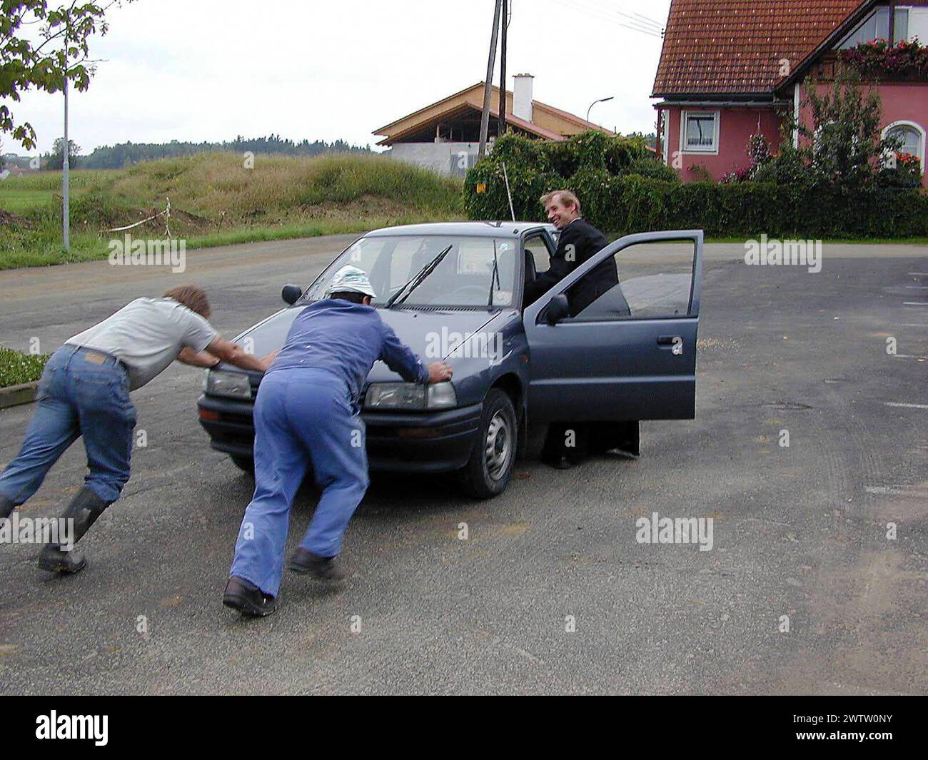 car repair after a breakdown, fixing broken parts of an automobile car ...