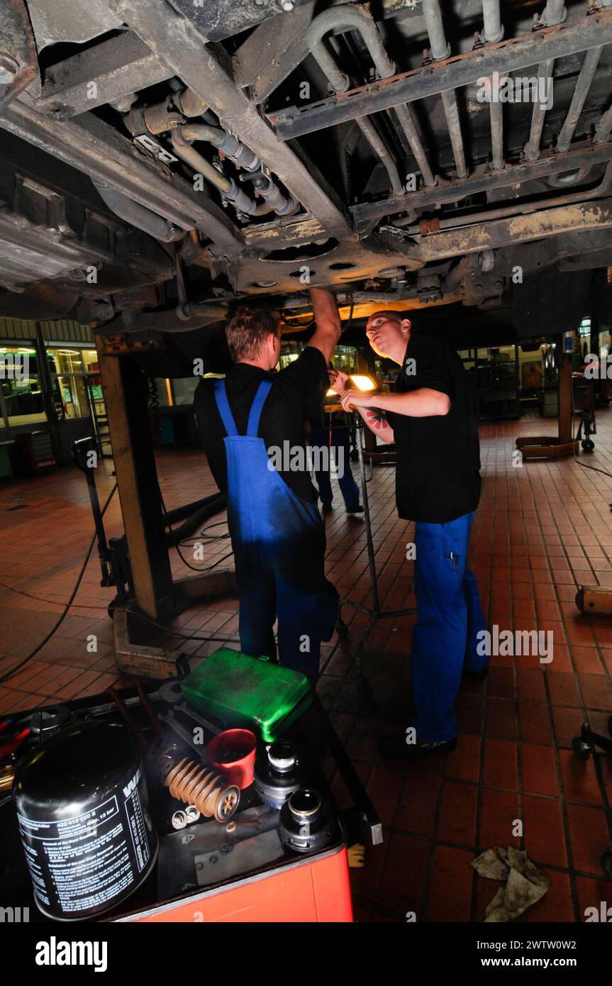 car repair after a breakdown, fixing broken parts of an automobile car ...
