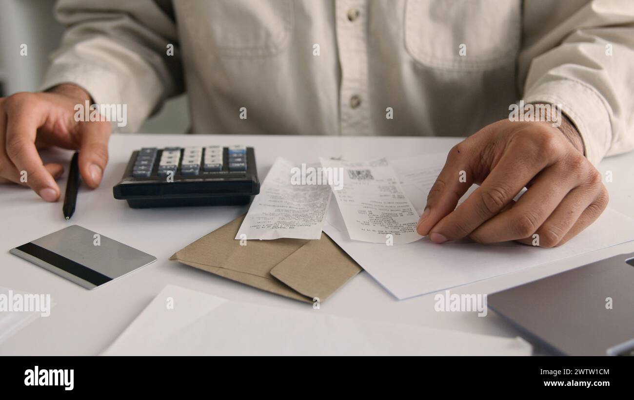 Unrecognizable man guy businessman using calculator and laptop ...