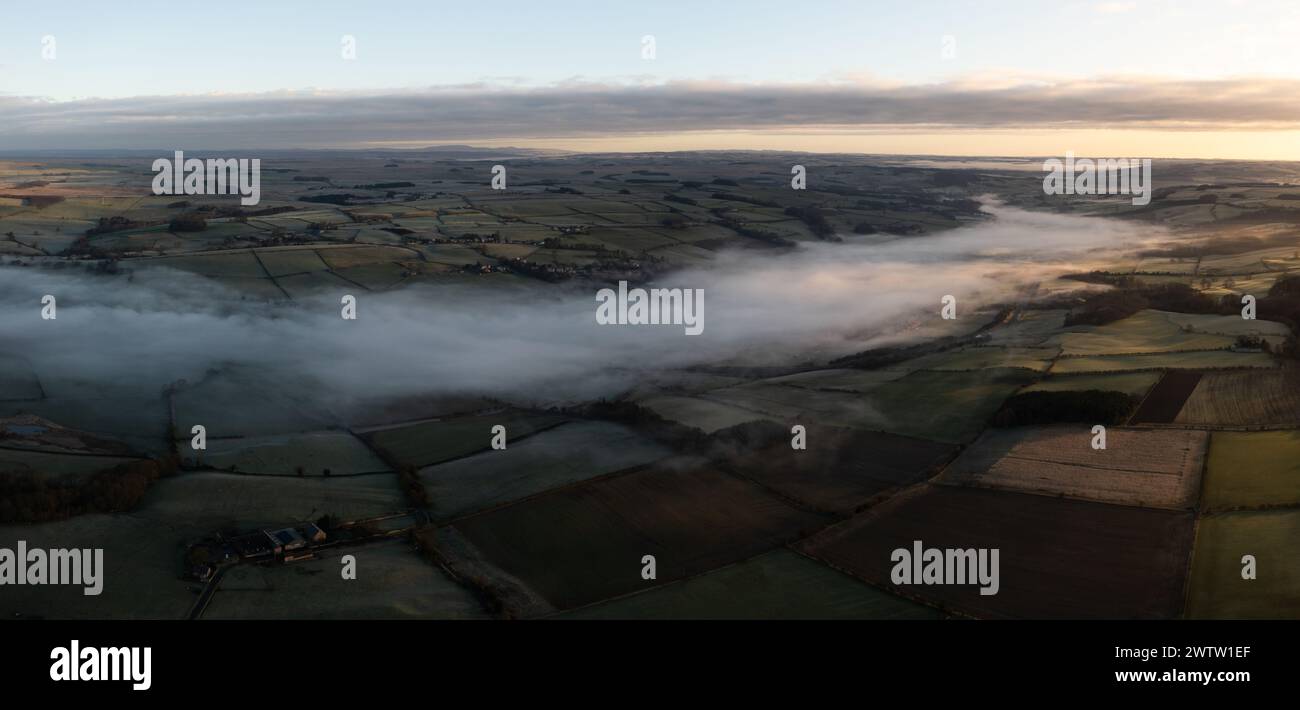 Aerial view of low lying mist or cloud inversion along the River Tyne ...
