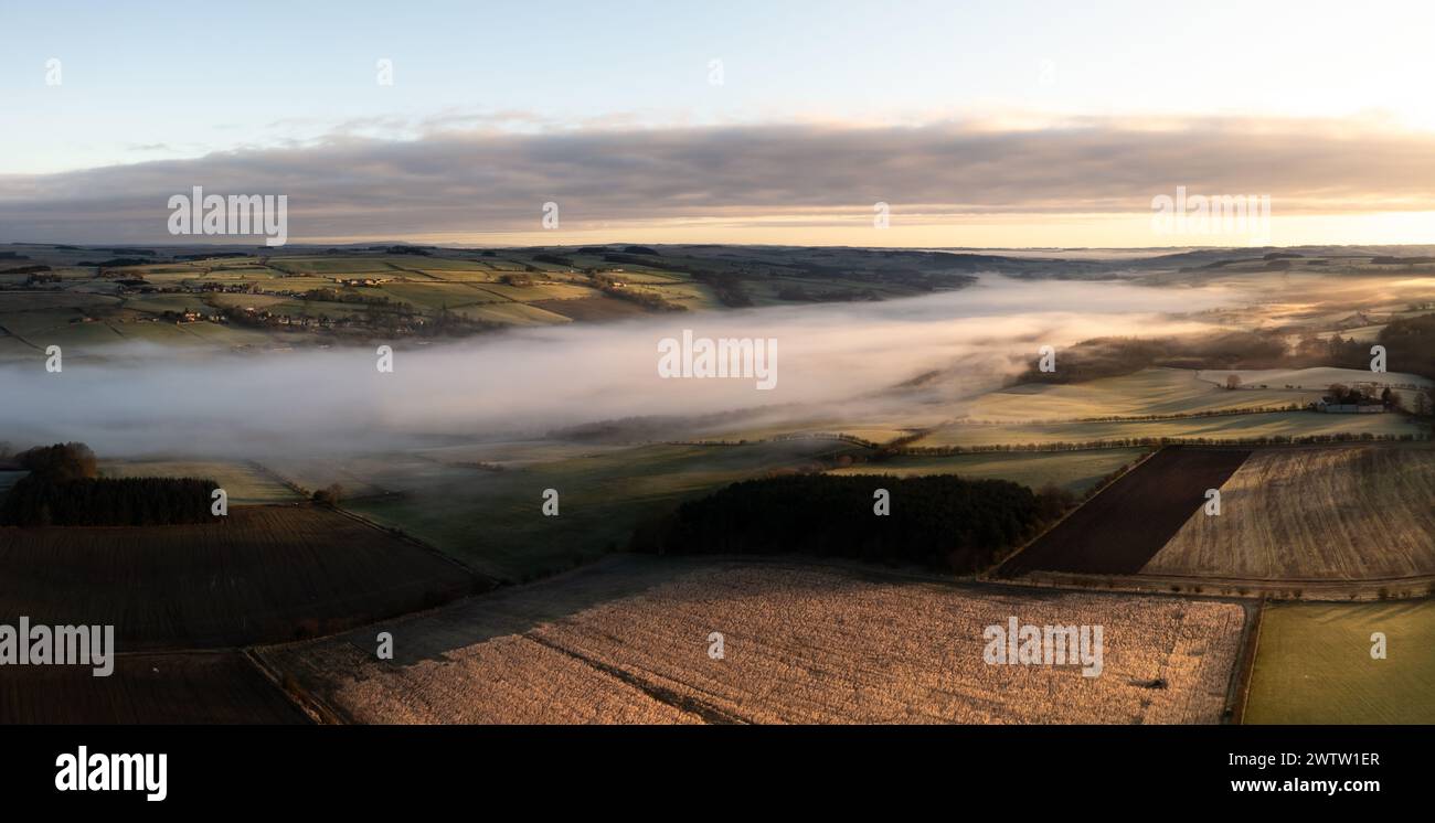 Aerial view of low lying mist or cloud inversion along the River Tyne ...
