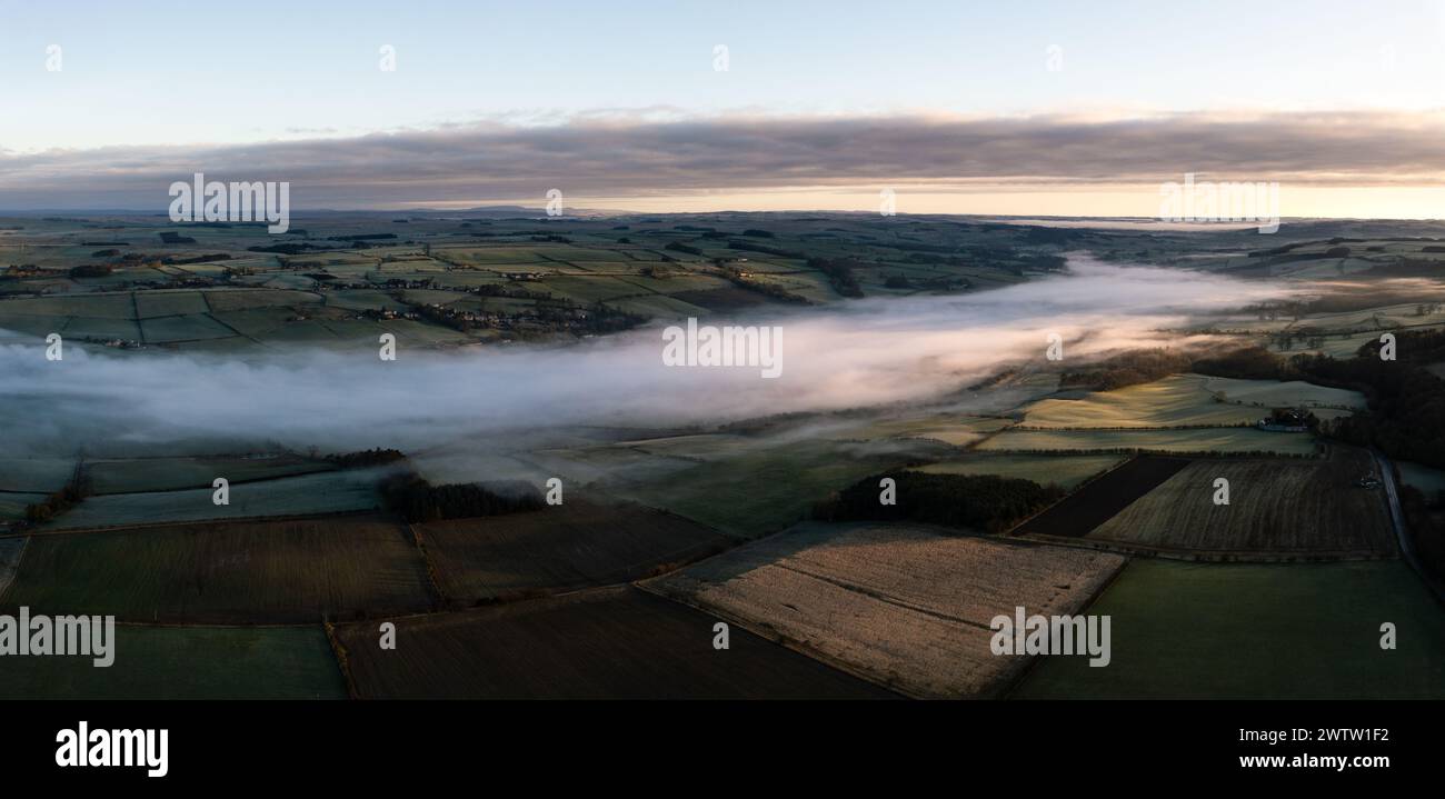 Aerial view of low lying mist or cloud inversion along the River Tyne ...