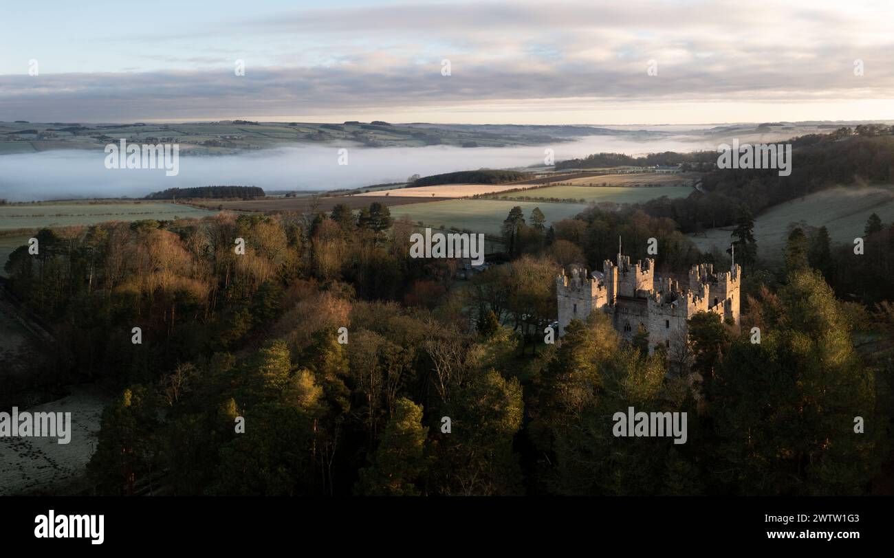 LANGLEY CASTLE, NORTHUMBERLAND, UK - MARCH 16, 2024. An aerial view of ...